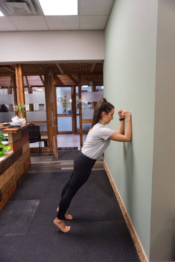 Shoulder Pack Rotations on Wall - Zen Physiotherapy